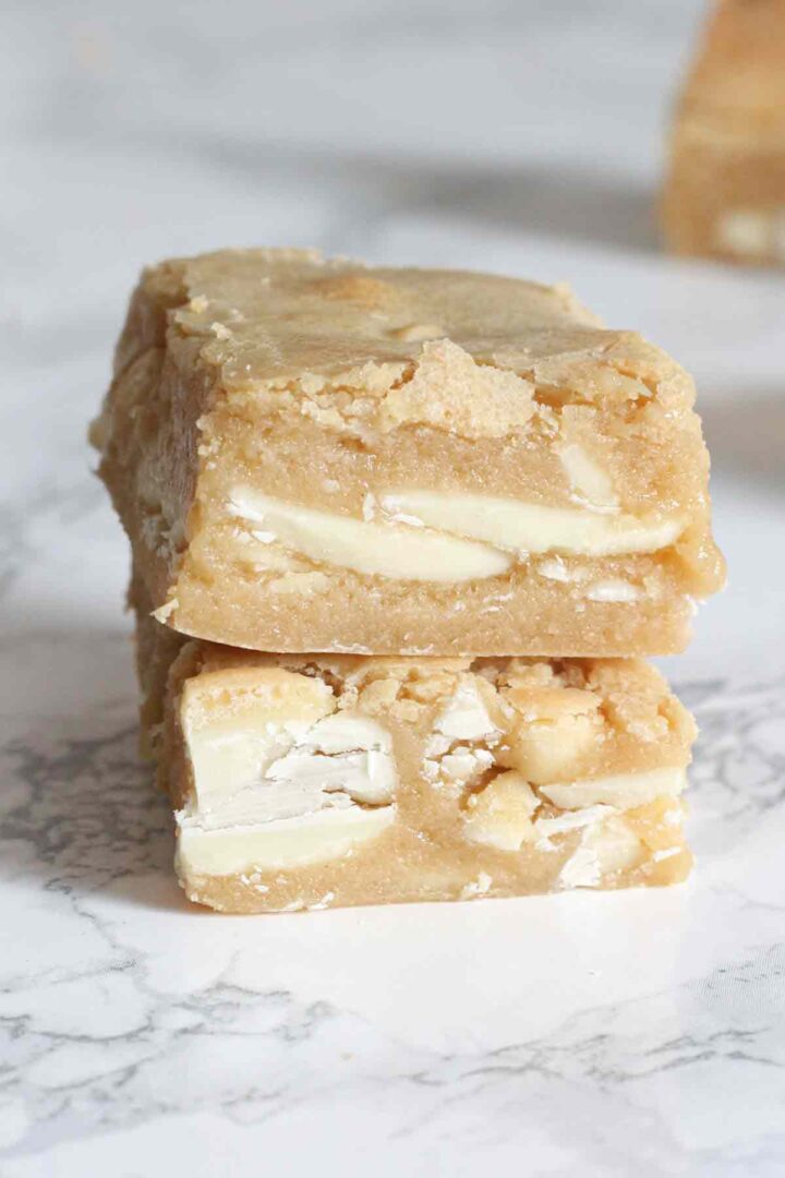 Easy Milky Bar Blondies - EatCookBake | Quick And Easy Dessert Recipes